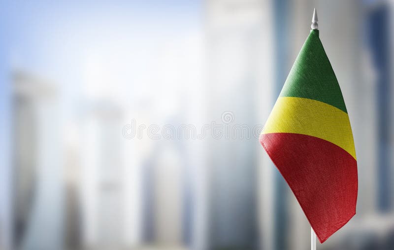 A Small Flag of Congo on the Background of a Blurred Background Stock ...