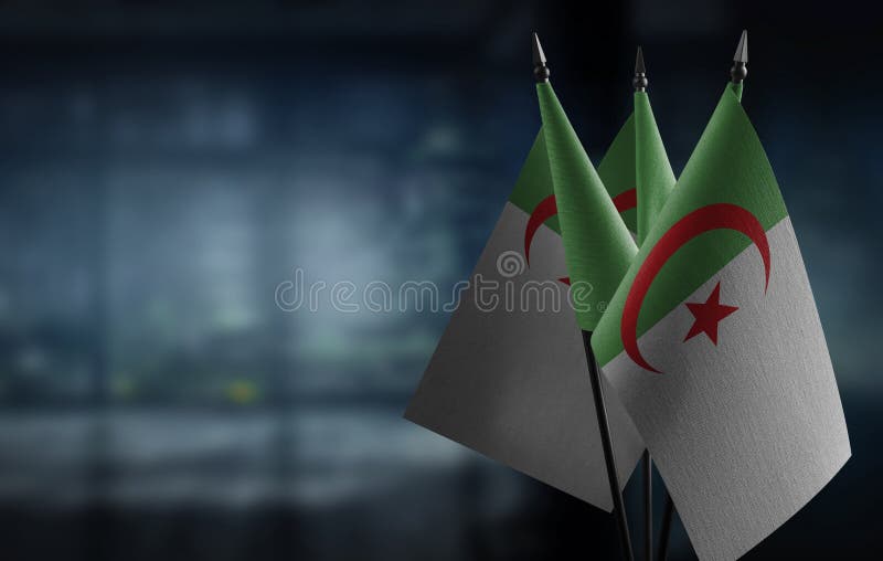 Small Flags of the Algeria on an Abstract Blurry Background Stock Image ...