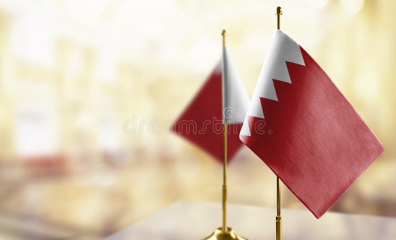 Small Flags of the Bahrain on an Abstract Blurry Background Stock Photo ...