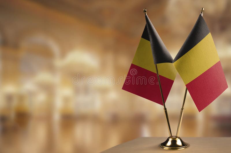Small Flags of the Belgium on an Abstract Blurry Background Stock Image ...