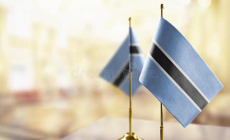 Small Flags of the Botswana on an Abstract Blurry Background Stock ...