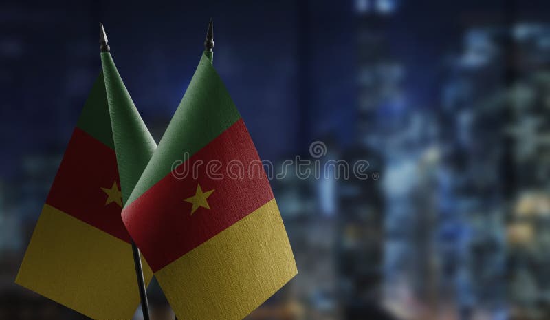 Small Flags of the Cameroon on an Abstract Blurry Background Stock Illustration - Illustration ...