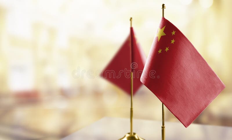 Small Flags of the China on an Abstract Blurry Background Stock Image ...