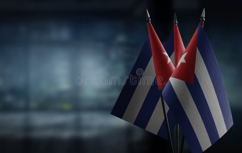Small Flags of the Cuba on an Abstract Blurry Background Stock Photo ...