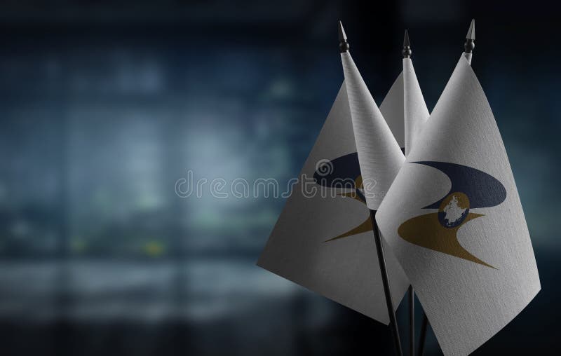 Small Flags of the Eurasian Economic Union on an Abstract Blurry ...
