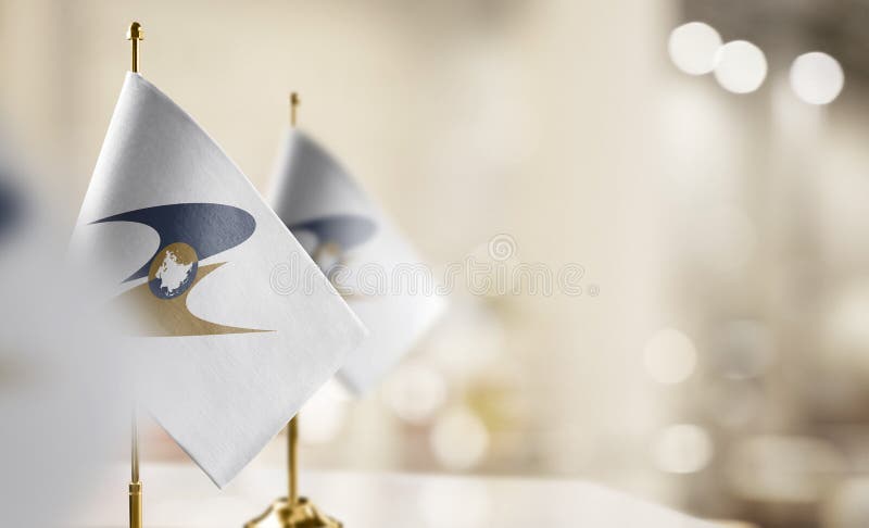 Small Flags of the Eurasian Economic Union on an Abstract Blurry ...