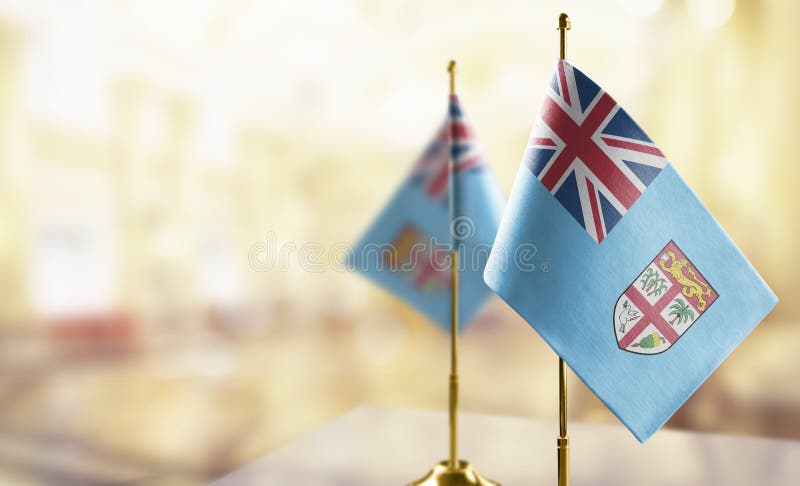 Small Flags of the Fiji on an Abstract Blurry Background Stock ...