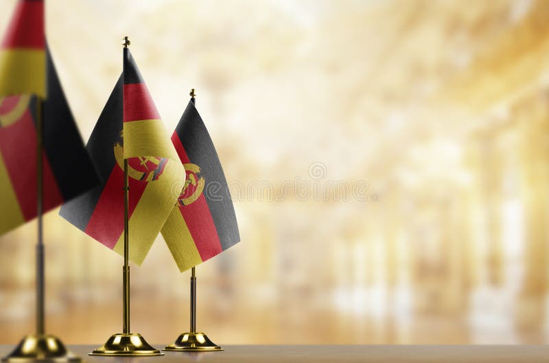 Small Flags of the GDR on an Abstract Blurry Background Stock Image ...