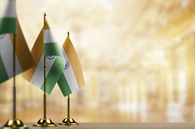 Small Flags of the India on an Abstract Blurry Background Stock Image ...