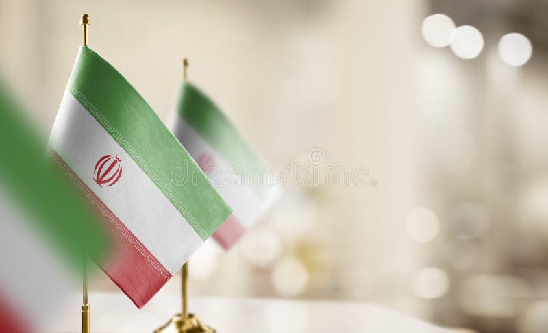 Small Flags of the Iran on an Abstract Blurry Background Stock Image ...