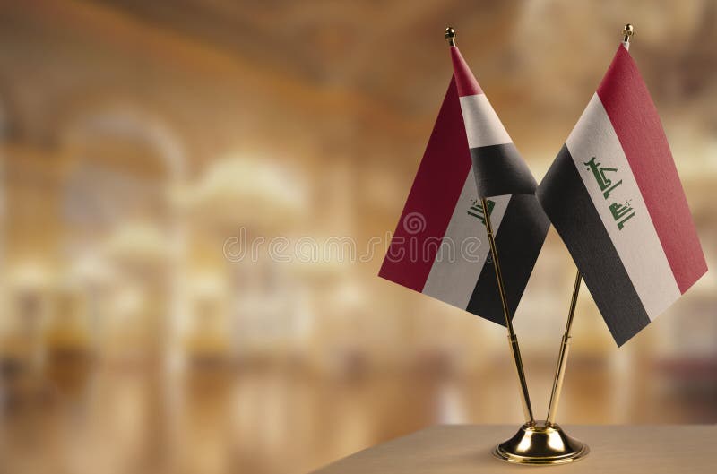 Small Flags of the Iraq on an Abstract Blurry Background Stock Photo ...