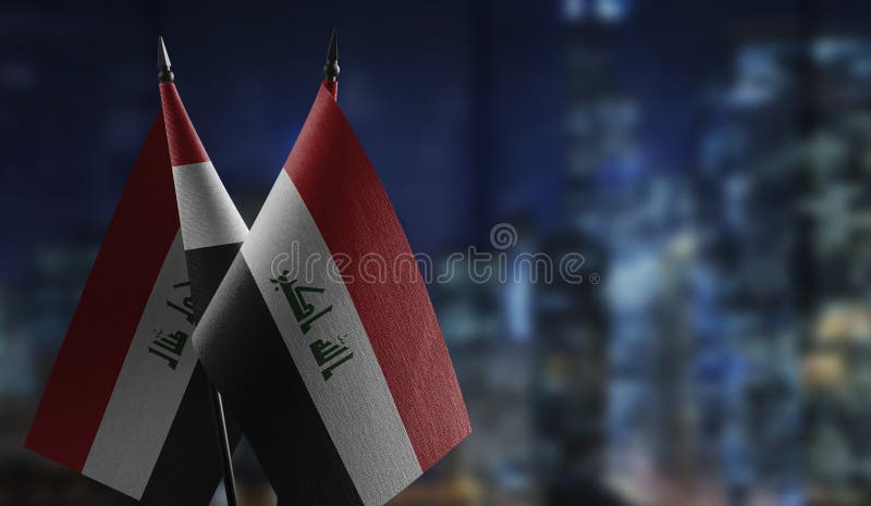 Small Flags of the Iraq on an Abstract Blurry Background Stock Photo ...