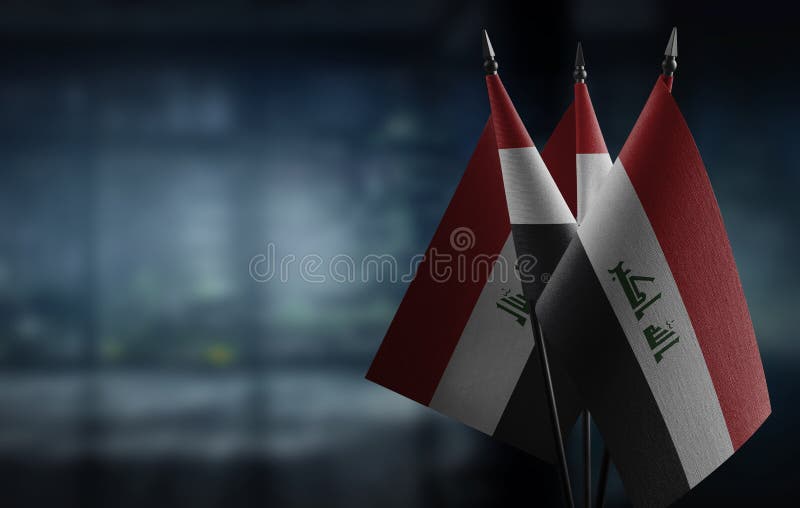 Small Flags of the Iraq on an Abstract Blurry Background Stock Photo ...