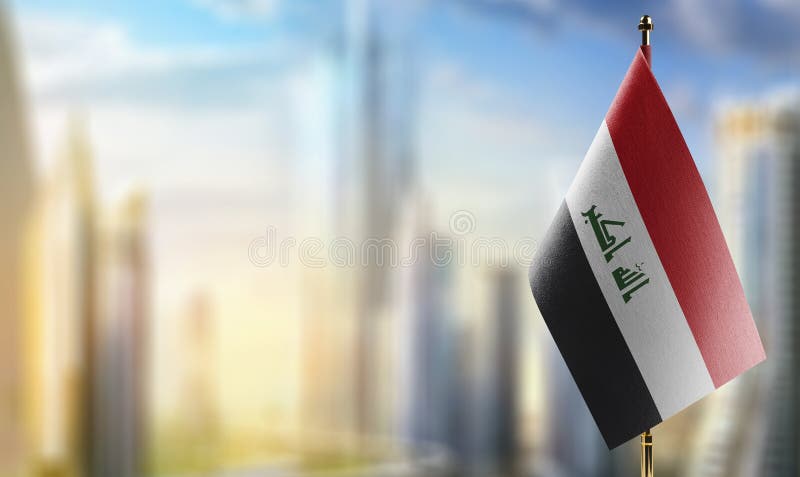 Small Flags of the Iraq on an Abstract Blurry Background Stock Photo ...