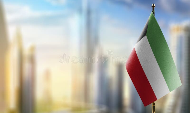 Small Flags of the Kuwait on an Abstract Blurry Background Stock Image ...
