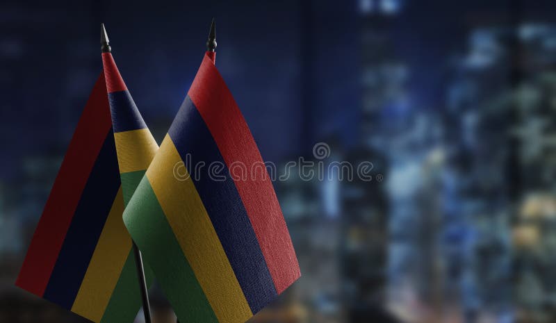 Small Flags of the Mauritius on an Abstract Blurry Background Stock ...