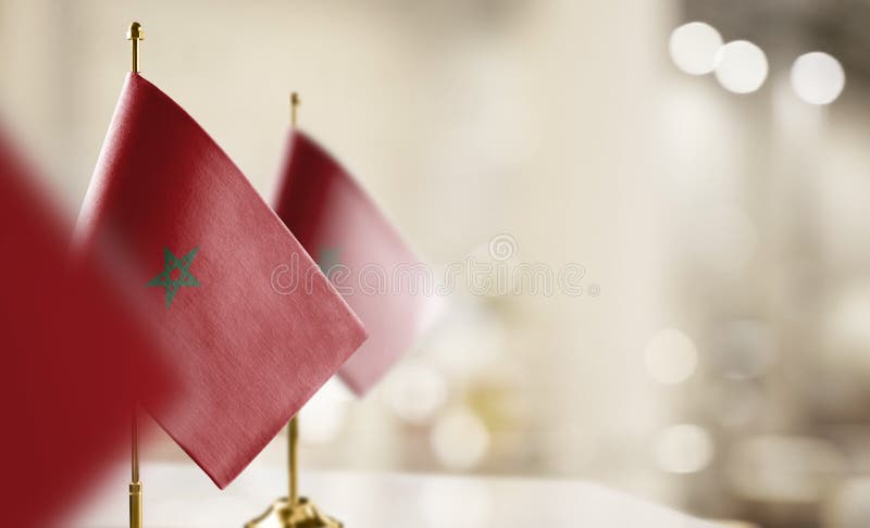 Small Flags of the Morocco on an Abstract Blurry Background Stock Image ...