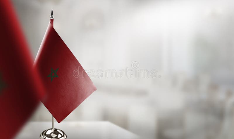 Small Flags of the Morocco on an Abstract Blurry Background Stock ...