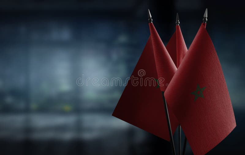 Small Flags of the Morocco on an Abstract Blurry Background Stock Photo ...