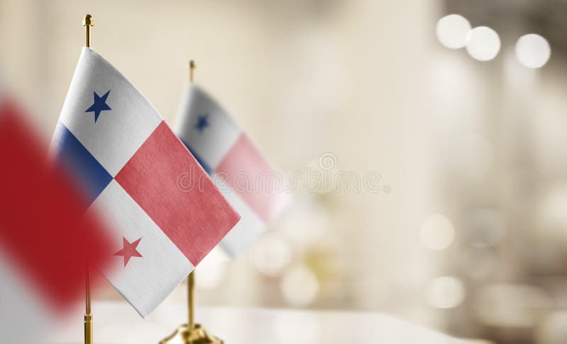 Small Flags of the Panama on an Abstract Blurry Background Stock Photo ...