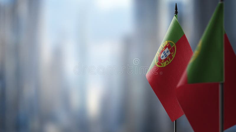 Small Flags of the Portugal on an Abstract Blurry Background Stock ...