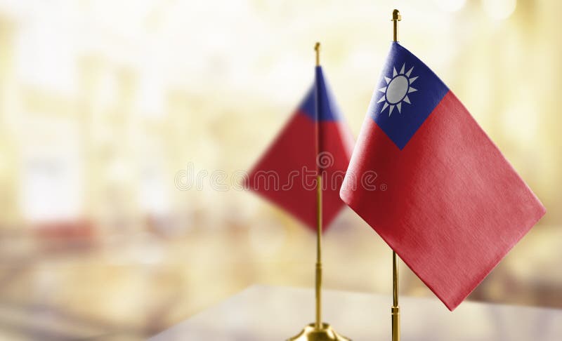 Small Flags of the Taiwan on an Abstract Blurry Background Stock Photo ...