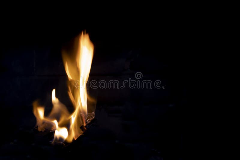 Small Flame of Fire on a Black Background, Horizontal Stock Image ...