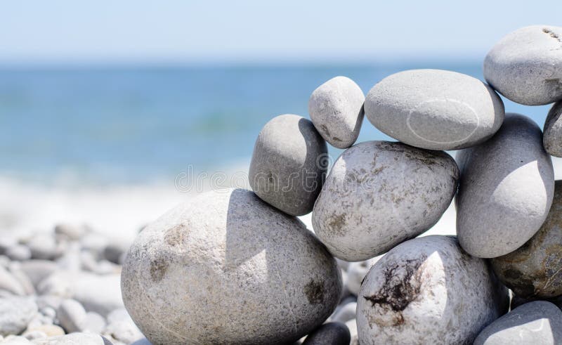 Small Flat Rock Balancing on Rock Beach Wall Stock Photo - Image of ...
