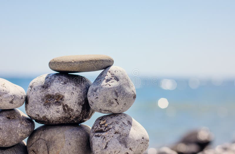 Small Flat Rock Balancing on Rock Beach Wall Stock Photo - Image of ...
