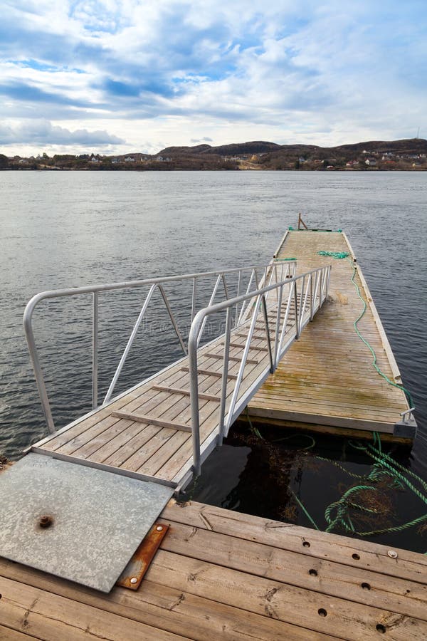 Small Pier With Boats On Lake In Foggy Morning Stock Image - Image of ...