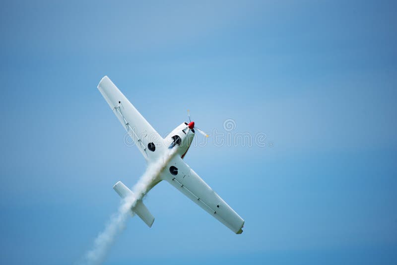 Small Flying Airplane on Blue Sky Stock Image - Image of airplane ...