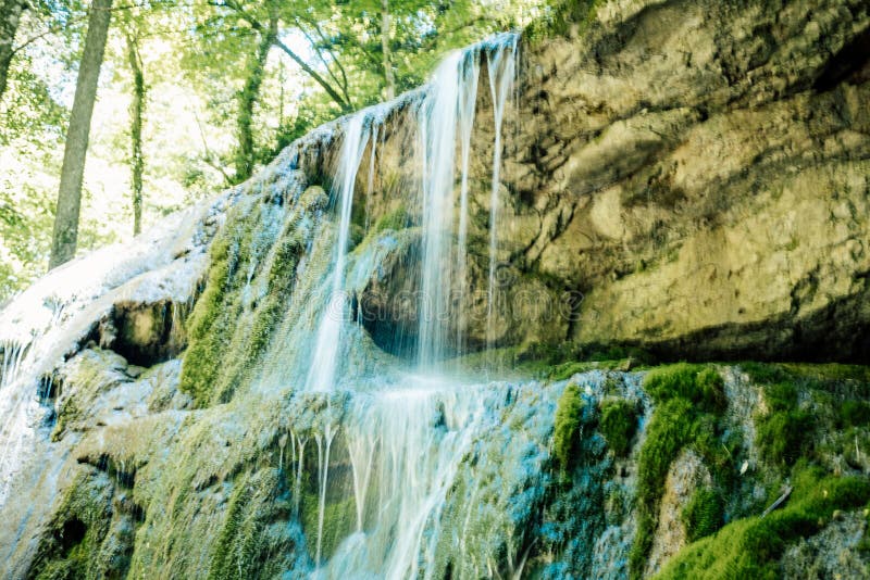 Small Forest Waterfall. Jets of Water Flowing Down from Boulders Stock ...