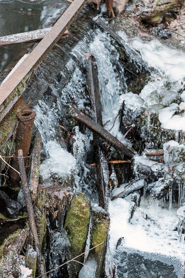A Small Freezing Waterfall in a Winter Park. Stock Photo - Image of ...