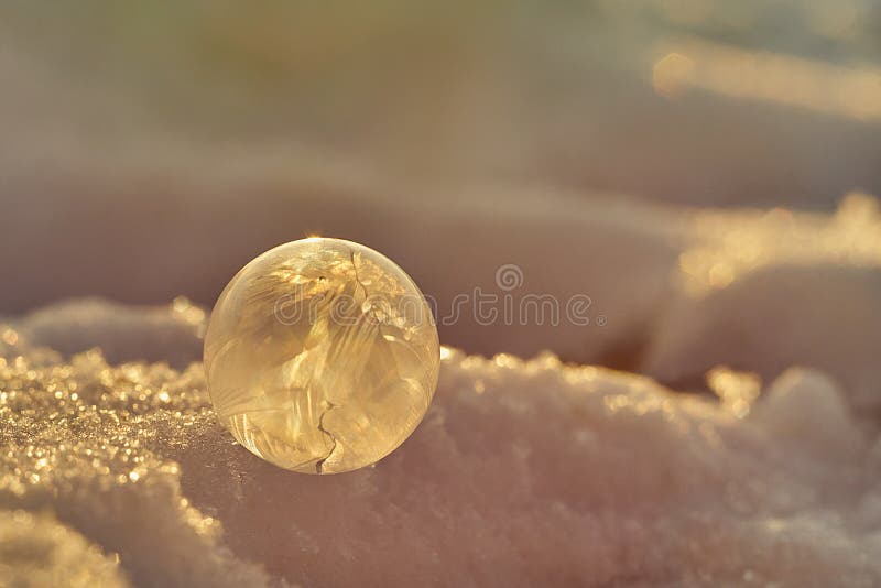 Small Frozen Bubble on a Winter Day on the Snow Stock Image - Image of ...