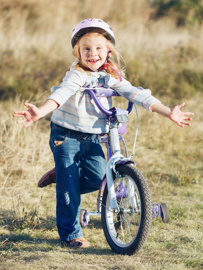 Small Funny Kid Riding Bike Stock Photo - Image of funny, park: 44822440