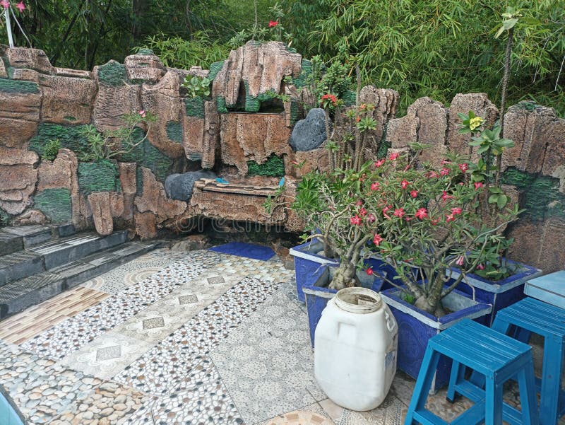 Small Garden in the Swimming Pool with Garbage Bin Stock Photo - Image ...
