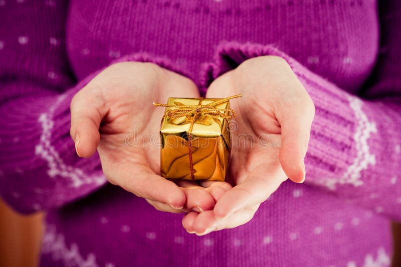 Small gift stock image. Image of xmas, holding, giving - 12181569