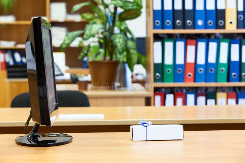 Small Gift Box Laing in Front of Monitor Screen Stock Photo - Image of ...