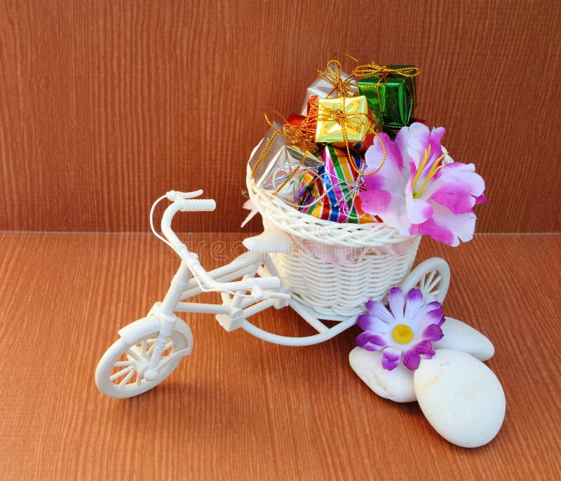 Small Gift Box in Plastic Bicycle Stock Photo - Image of stone, bicycle ...