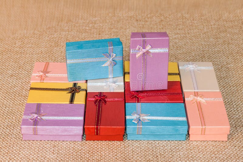 Small Gift Box Set on Sack Cloth Stock Image - Image of boxes, small ...