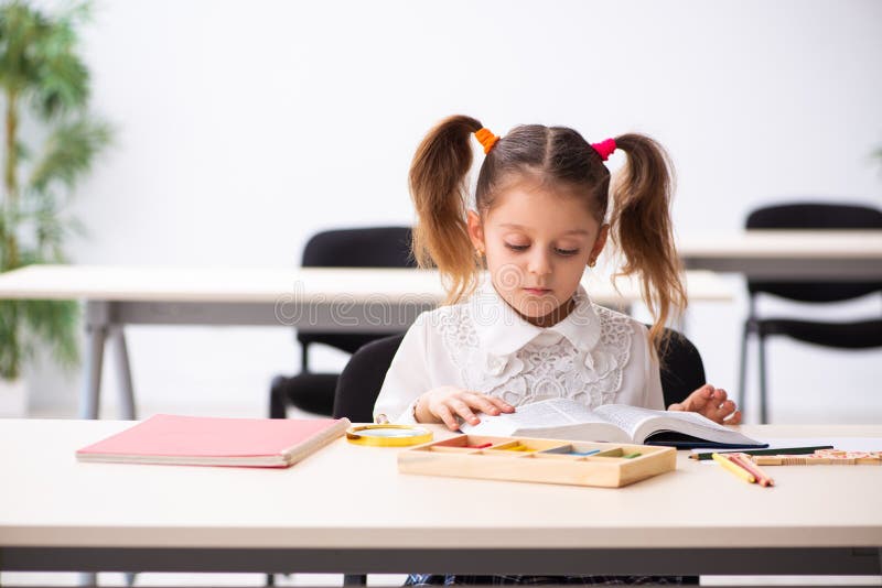 Small Girl in Early Development Concept Stock Photo - Image of book ...
