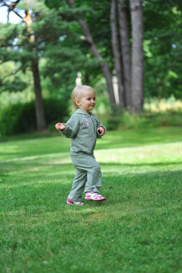 Small girl having fun stock photo. Image of baby, childhood - 10990584