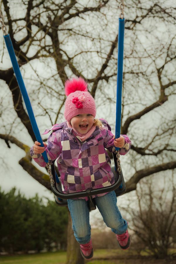 Small Girl Having Fun on the Children S Attractions Stock Image - Image ...