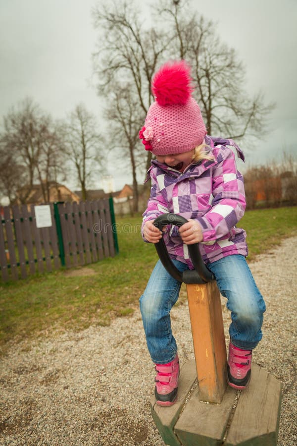 Small Girl Having Fun on the Children S Attractions Stock Image - Image ...