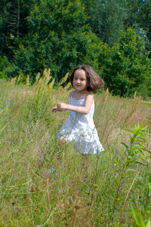 Small girl running stock photo. Image of girl, vertical - 11904096