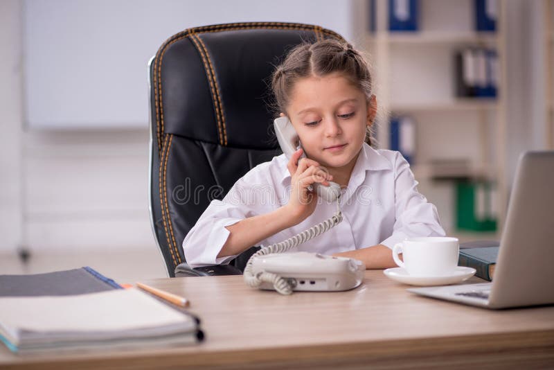 Small Girl Sitting in the Classroom Stock Photo - Image of textbooks ...
