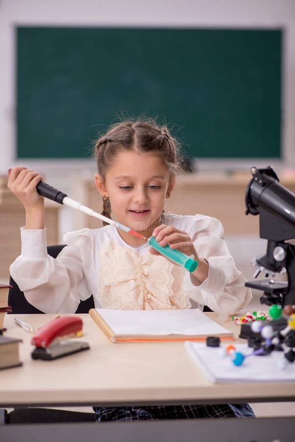 Small Girl Studying Chemistry in the Classroom Stock Photo - Image of ...