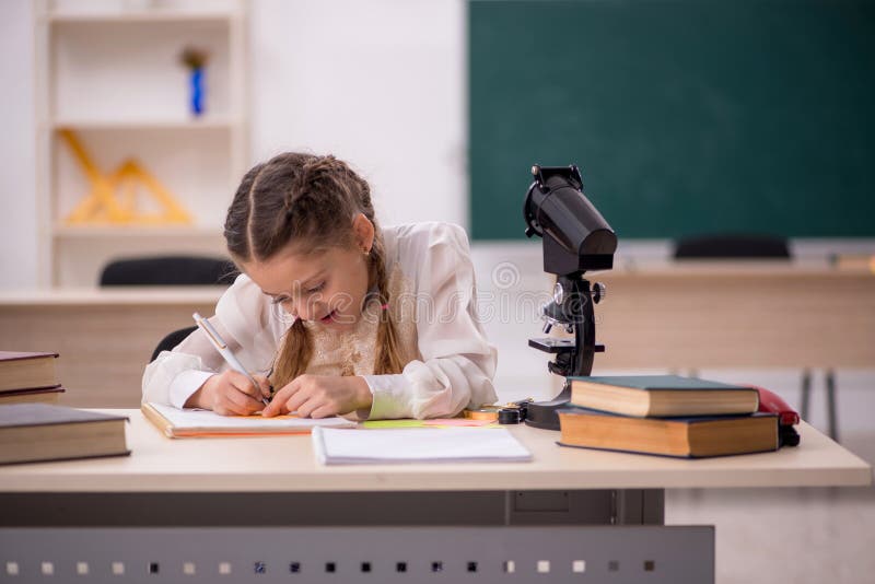 Small Girl Studying Chemistry in the Classroom Stock Image - Image of ...