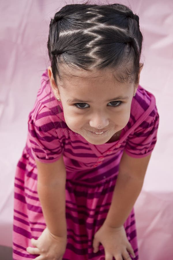 Small Girl With Teasing Smile Stock Photo - Image: 15837670