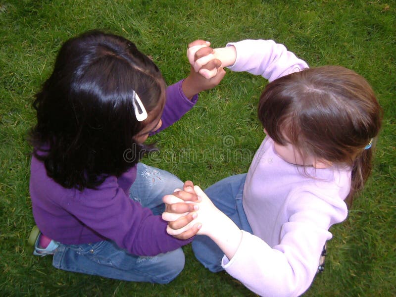 Small Girls Playing Together Stock Photo - Image of sitting, friendship ...